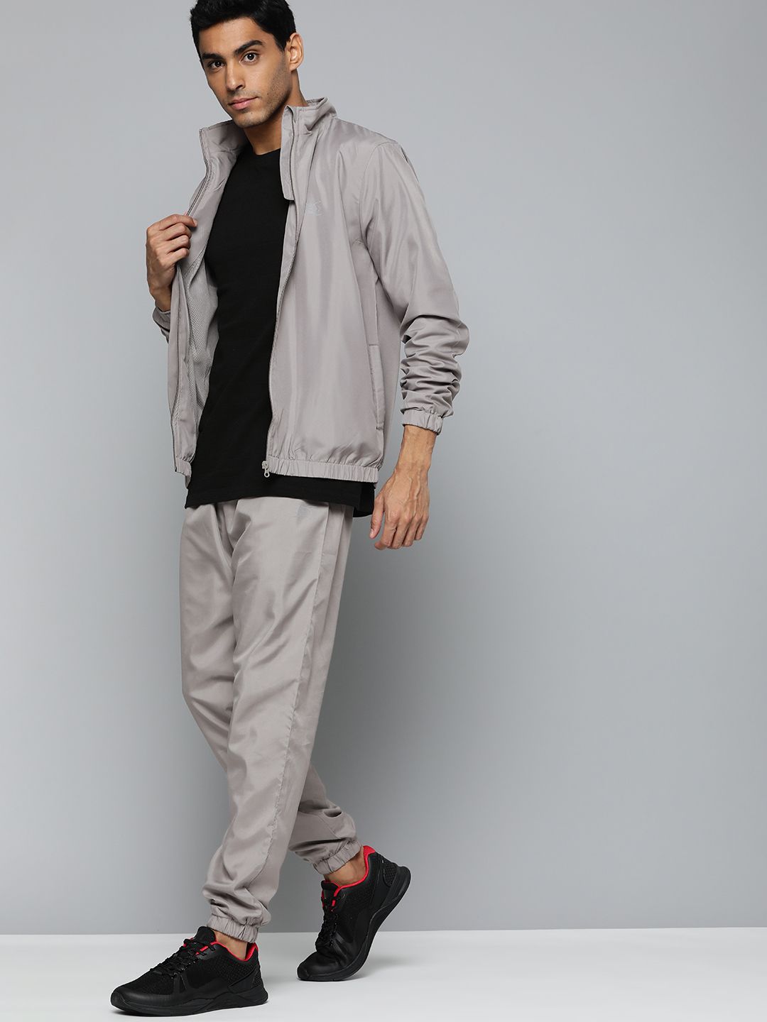 HRX by Hrithik Roshan Men Grey Solid Rapid-Dry Running Tracksuit ...
