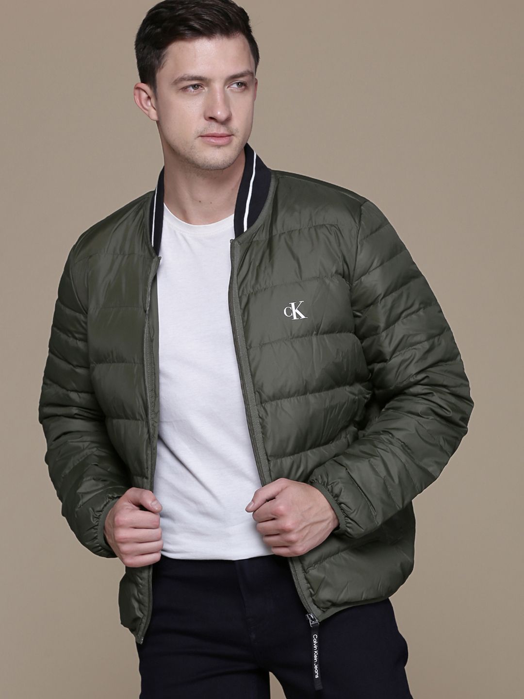 Calvin Klein Jeans Men Green Solid Puffer Jacket - Price History