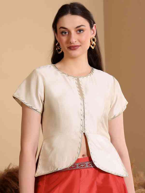 cream colored blouse