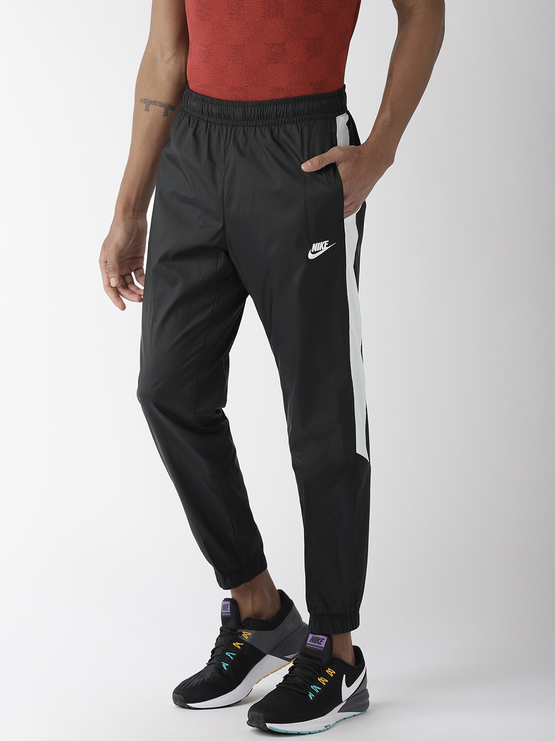 Buy Nike Men Black Loose Fit AS NSW CE CF CRE TK Solid Track Pants ...