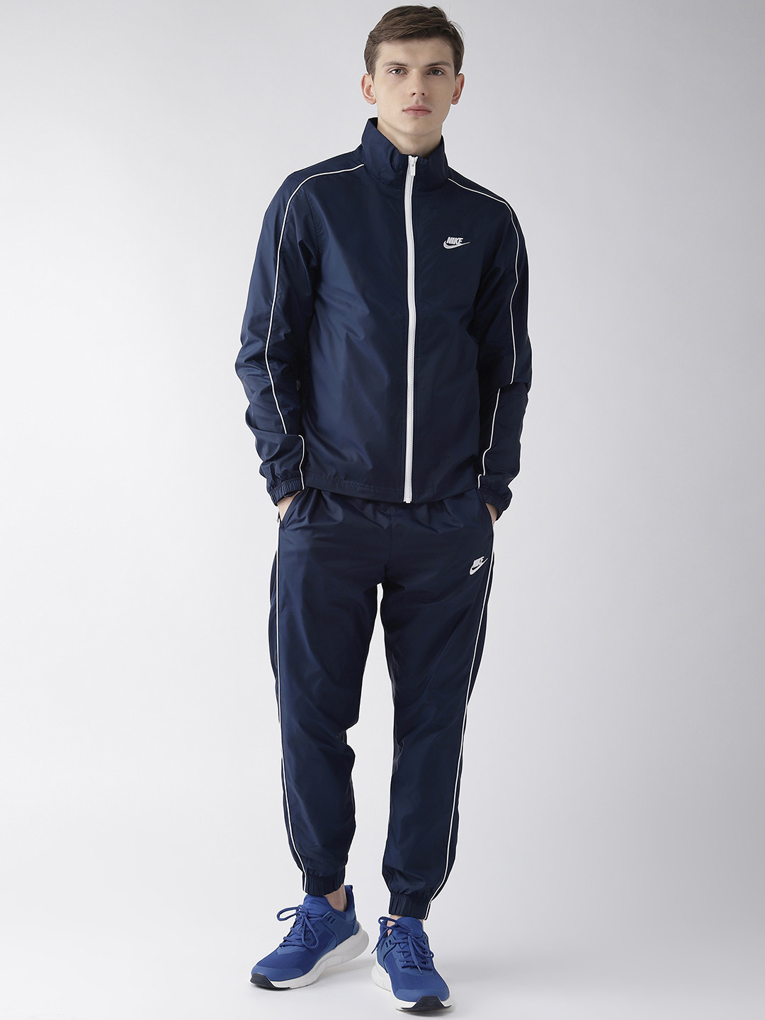 Buy Nike Sportswear Men Navy Blue Solid AS M NSW CE TRK SUIT WVN BASIC ...
