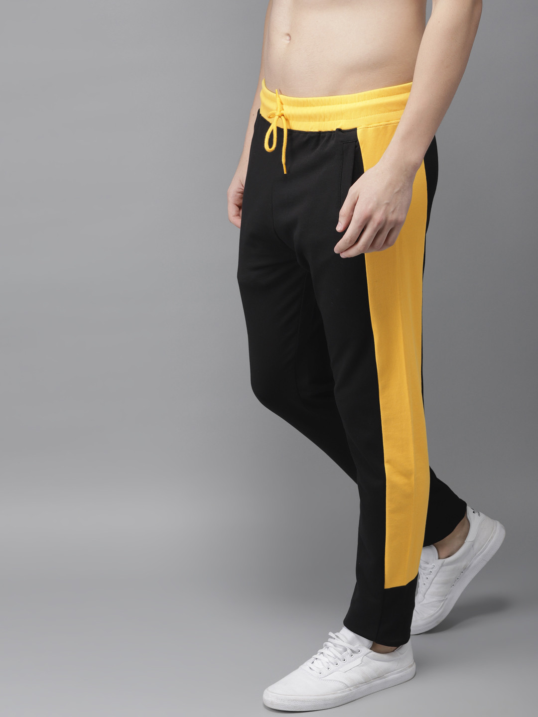Buy HERE&NOW Men Black & Yellow Colourblocked Track Pants - Track Pants ...