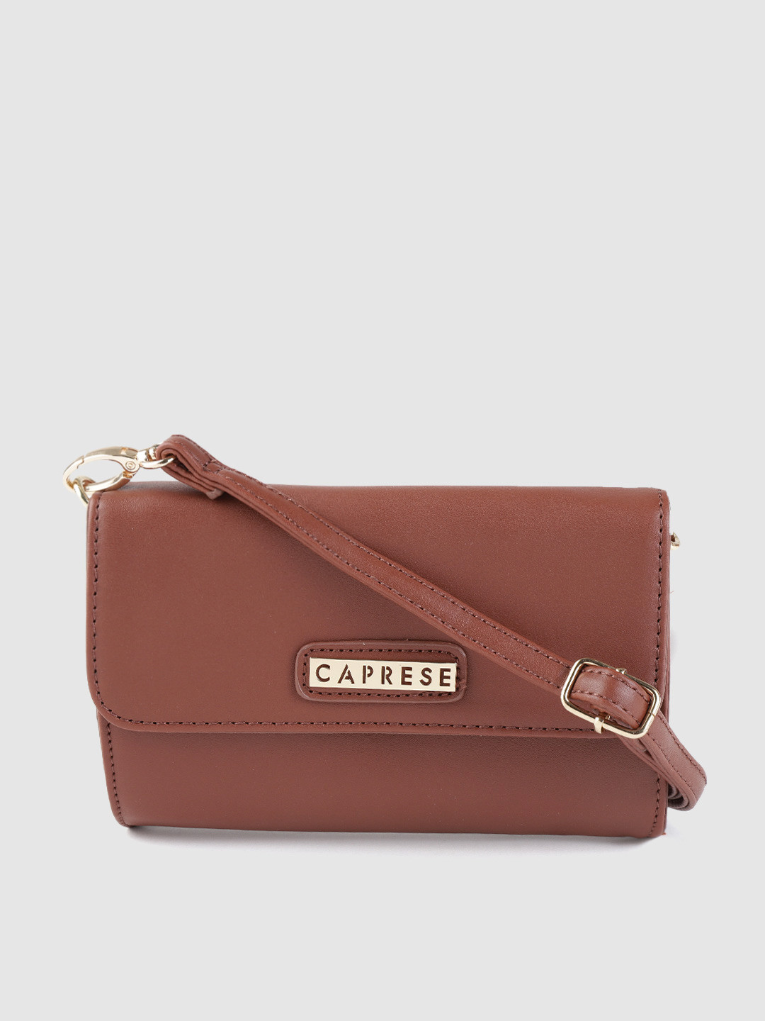Buy Caprese Brown Solid Purse - Clutches for Women 10331803 | Myntra