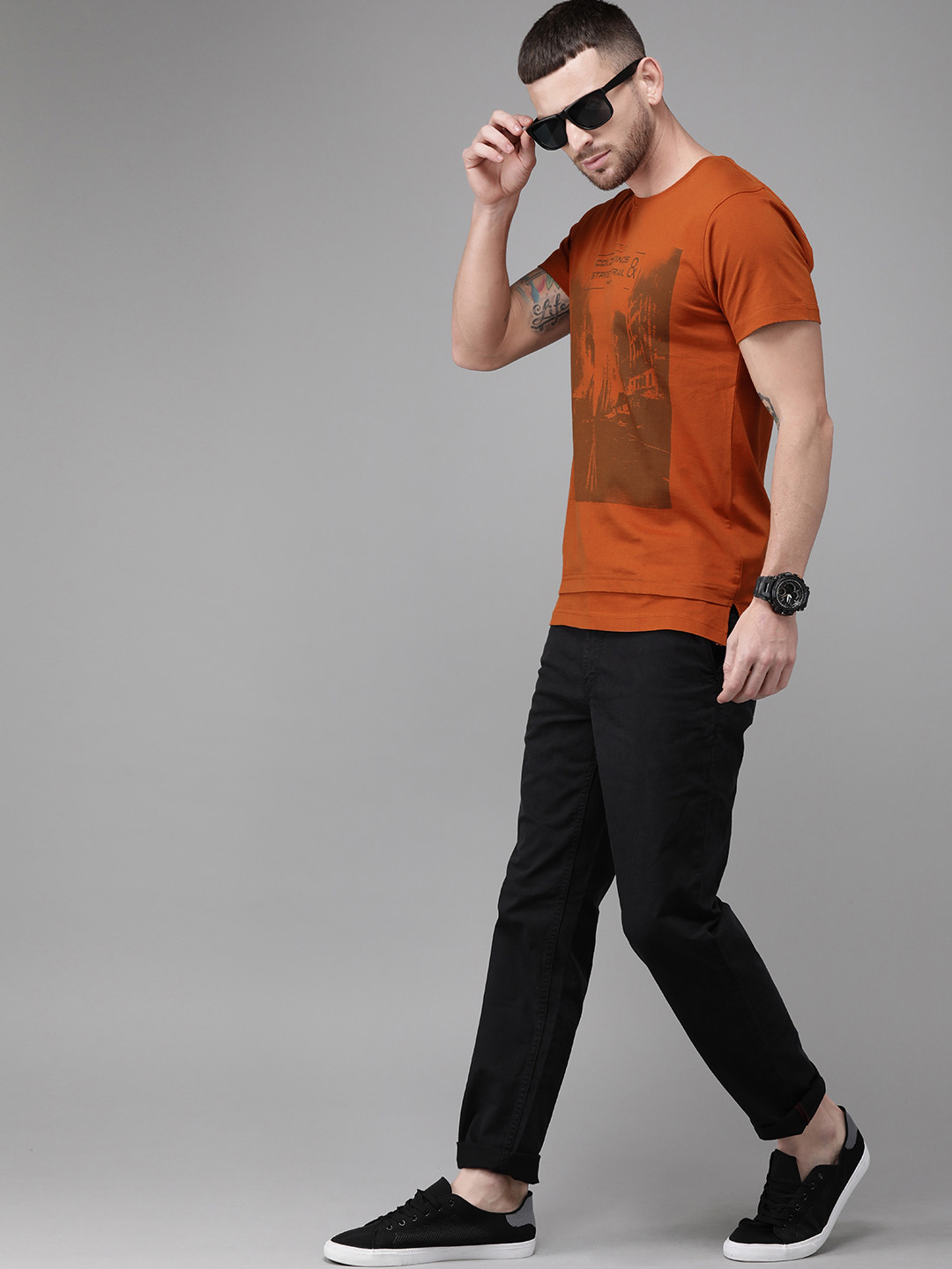 Buy Roadster Men Rust Orange Printed Round Neck Pure Cotton T Shirt ...
