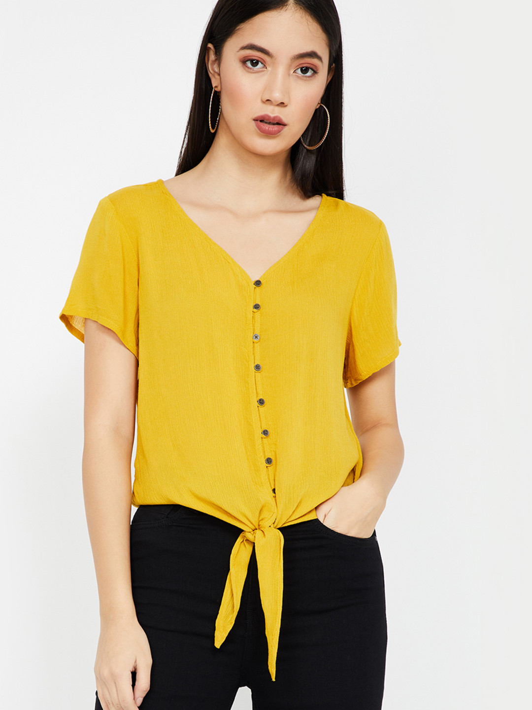Buy Bossini Women Yellow Solid Top - Tops for Women 10760258 | Myntra