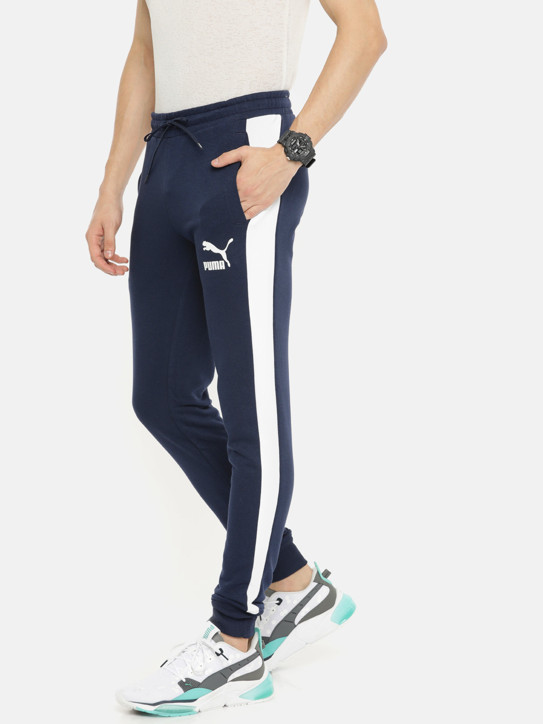 Buy Puma Men Navy Blue Solid Straight Fit Iconic T7 Track Sustainable ...