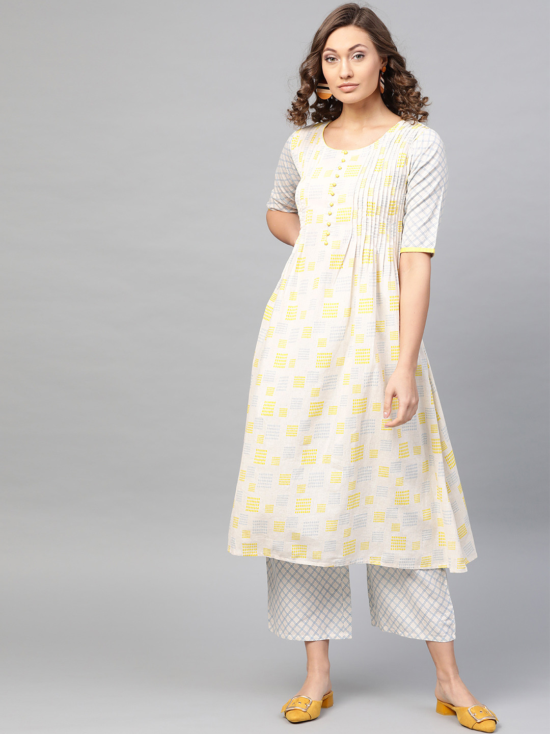 Buy Gerua By Libas Women White Yellow Printed Kurta With Palazzos ...