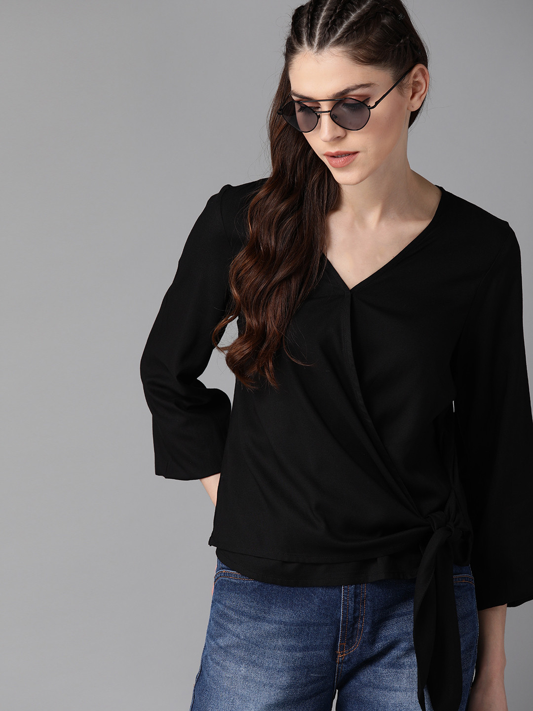 Buy The Roadster Lifestyle Co Women Black Solid Wrap Top - Tops for ...