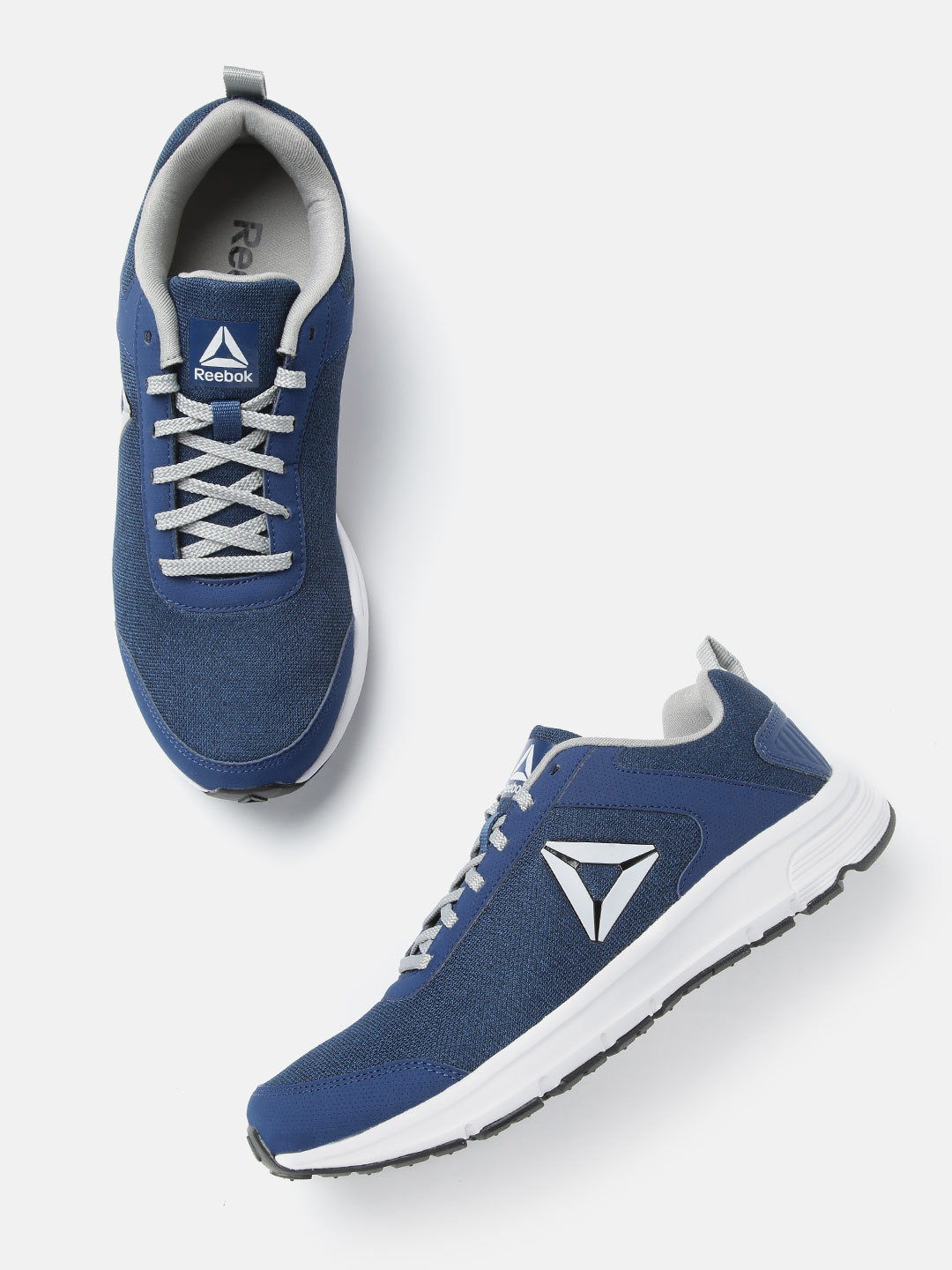 Buy Reebok Men Teal Blue Solid Canton LP Running Shoes - Sports Shoes ...