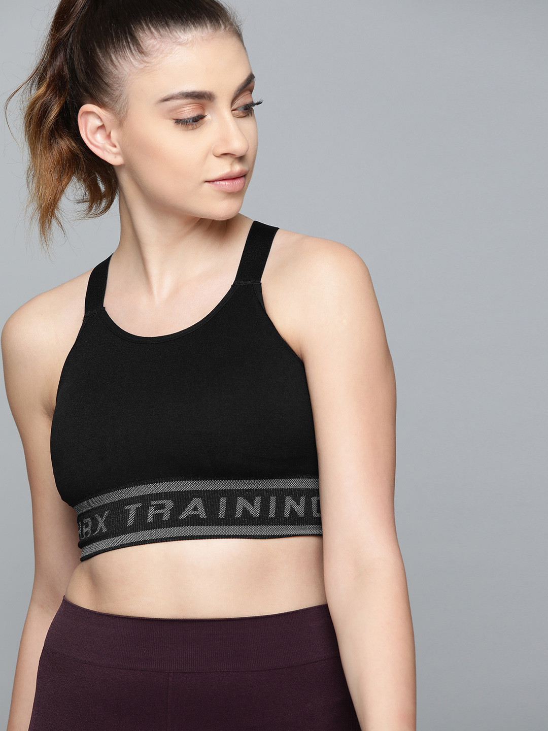 Buy HRX By Hrithik Roshan Black Solid Medium Support Seamless Rapid Dry ...