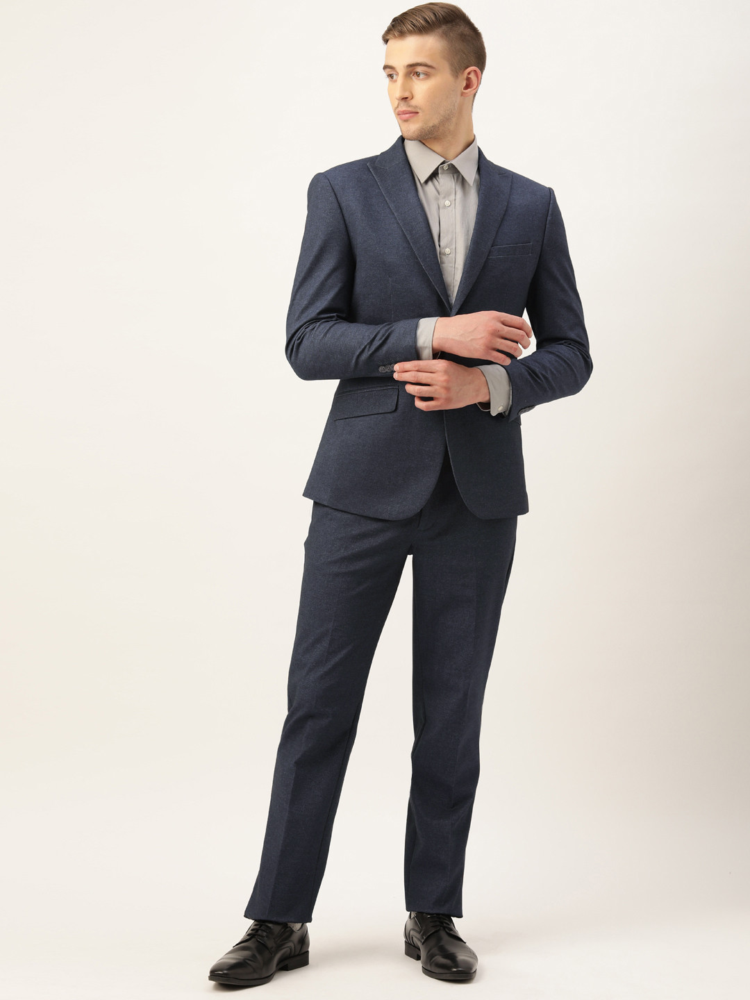 Buy Peter England Men Navy Blue Solid Tailored Fit Single Breasted ...