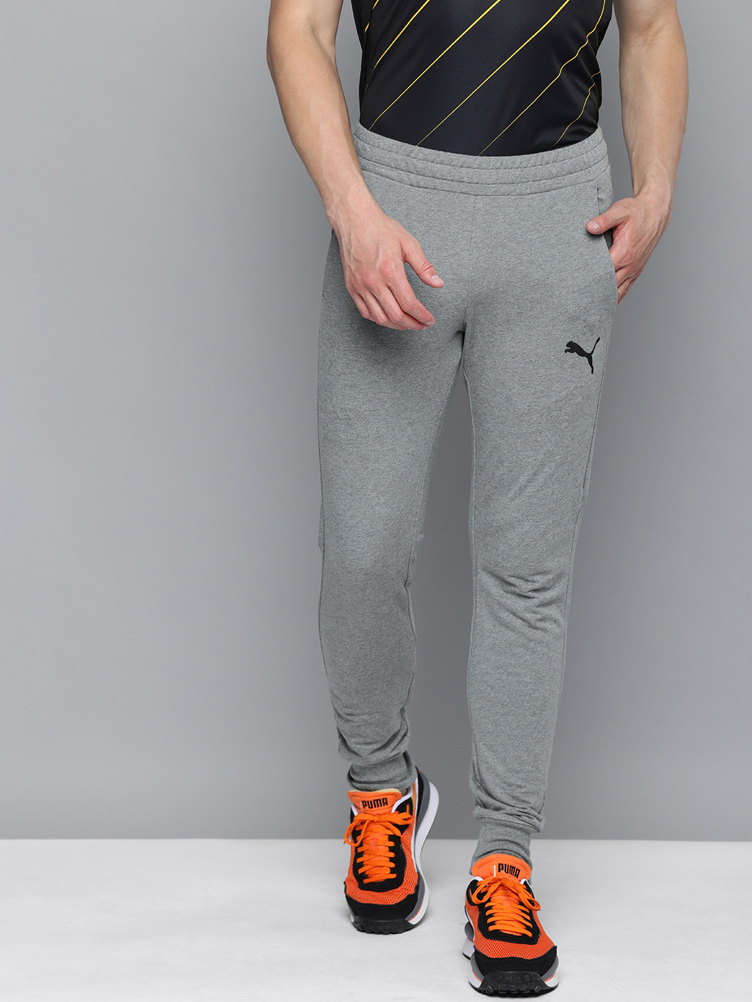 Buy Puma Men Grey Slim Fit ESS+ Solid Joggers - Track Pants for Men ...