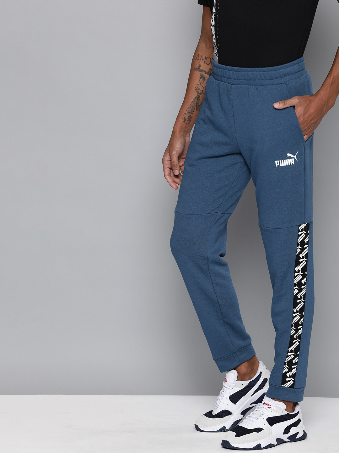 Buy Puma Men Navy Blue Straight Fit Solid AMPLIFIED Joggers With Side ...
