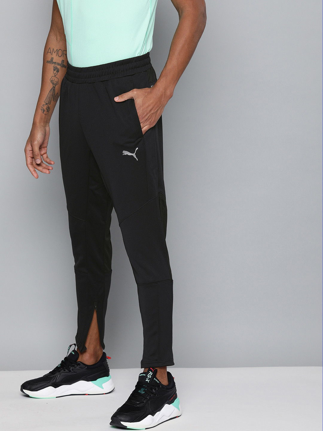Buy Puma Men Black Solid Blaster Woven Slim Fit Running Track Pants ...