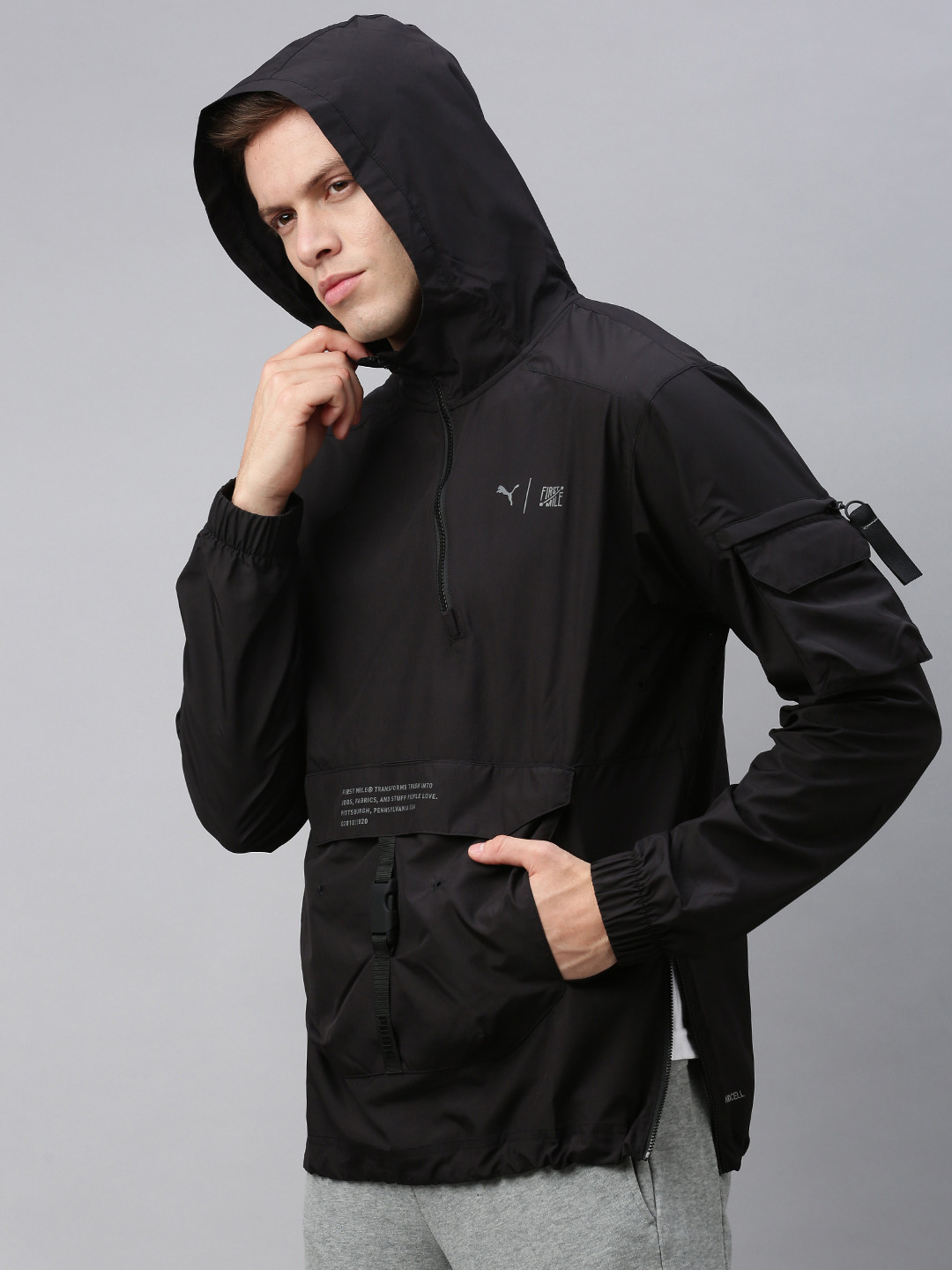 Buy Puma Men Black Solid First Mile Utility Sporty Jacket With Printed ...
