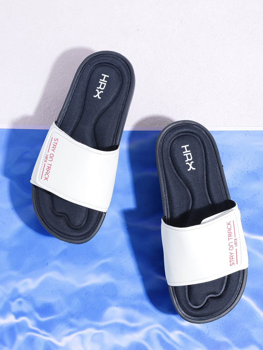 Buy HRX By Hrithik Roshan Men White & Navy Blue Memory Foam Sliders ...