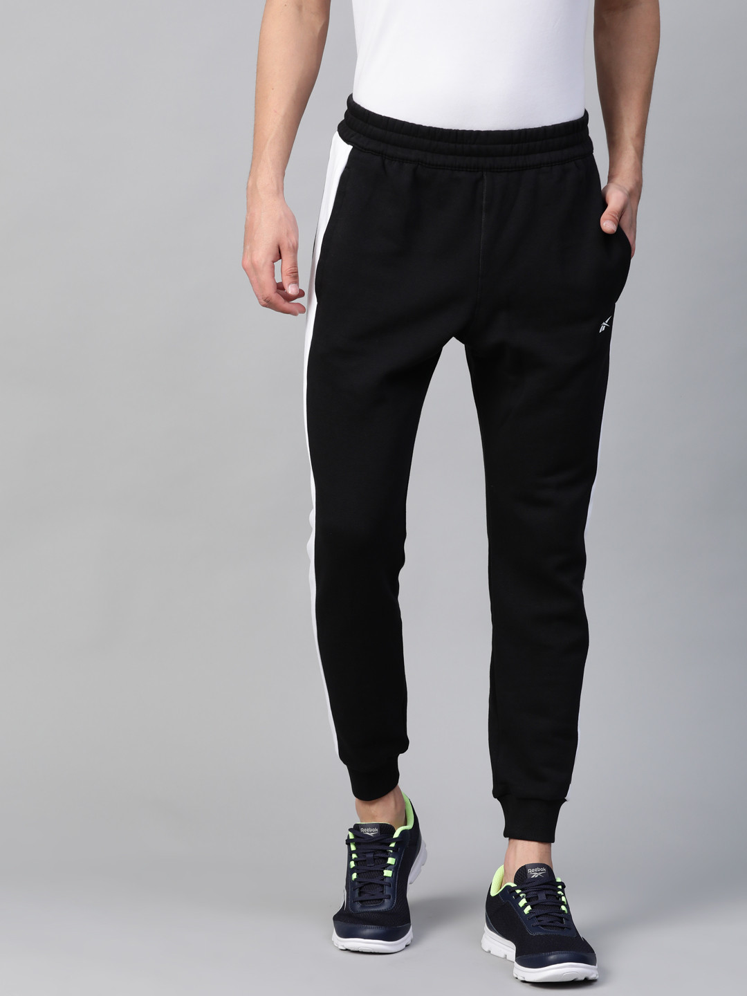 Buy Reebok Men Black Solid Training Essentials Linear Logo Joggers ...
