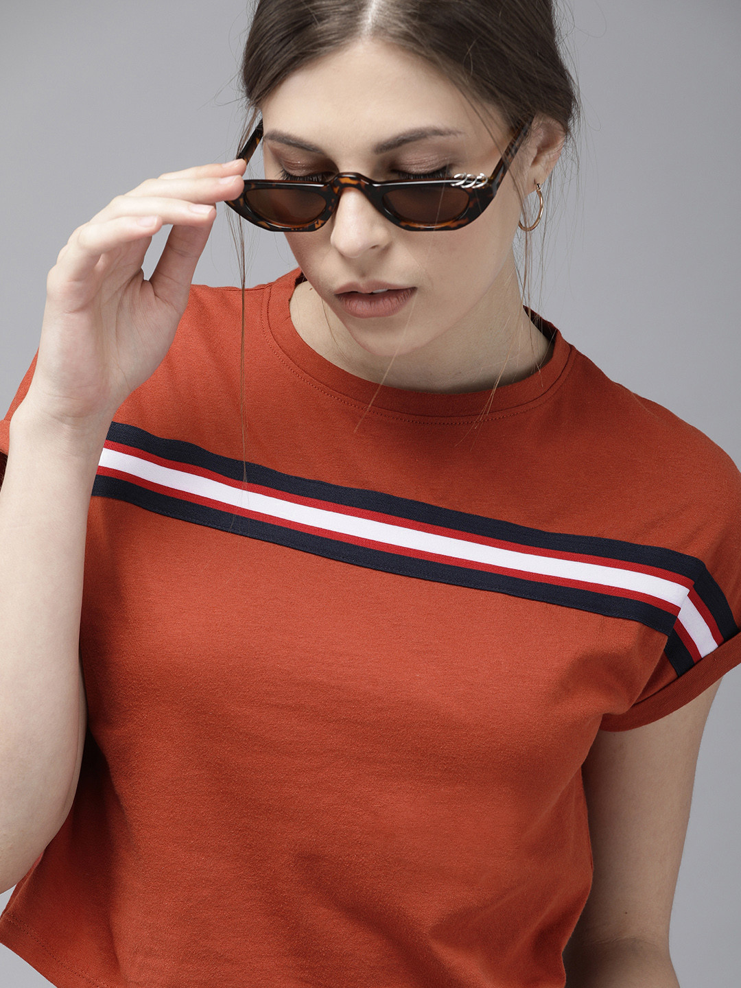 Buy Roadster Women Rust Orange Solid Round Neck Cropped Pure Cotton T ...