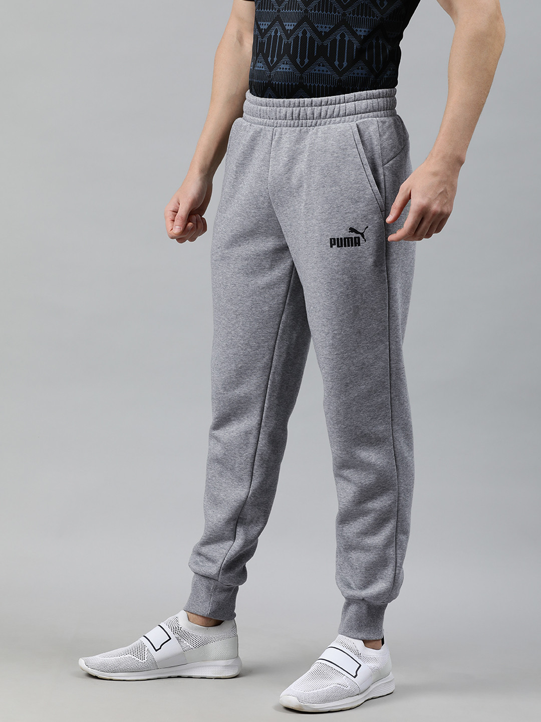 Buy Puma Men Grey Solid Straight Fit ESS Logo Pants FL Cl Joggers ...