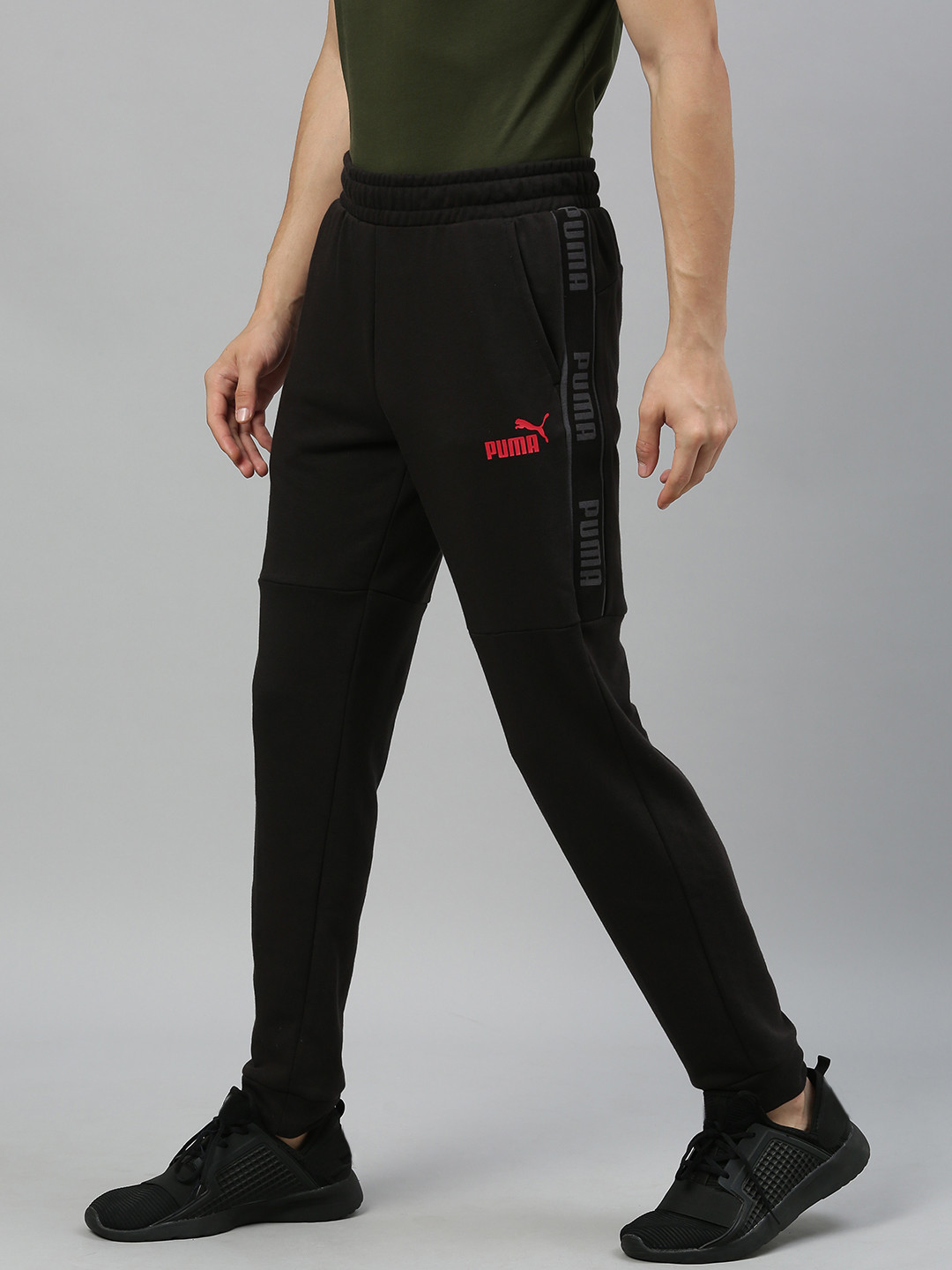 Buy Puma Men's Blue Solid ACM Ftbl Culture Football Track Pants - Track ...