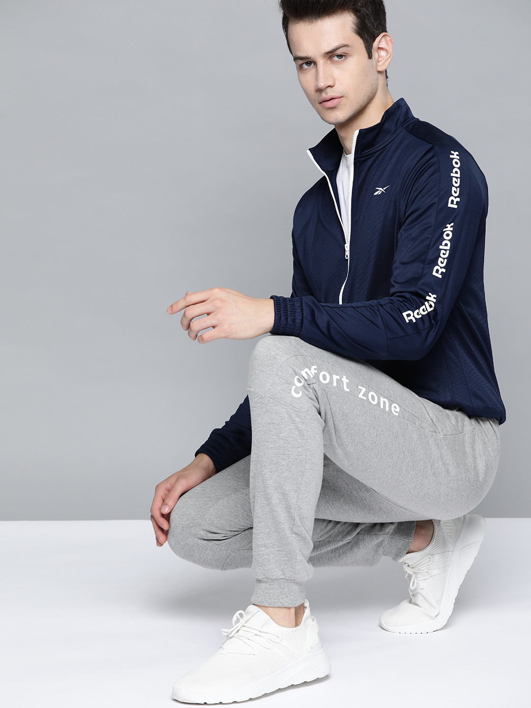 Buy Reebok Men Navy Blue Training Essentials Linear Logo Jacket ...