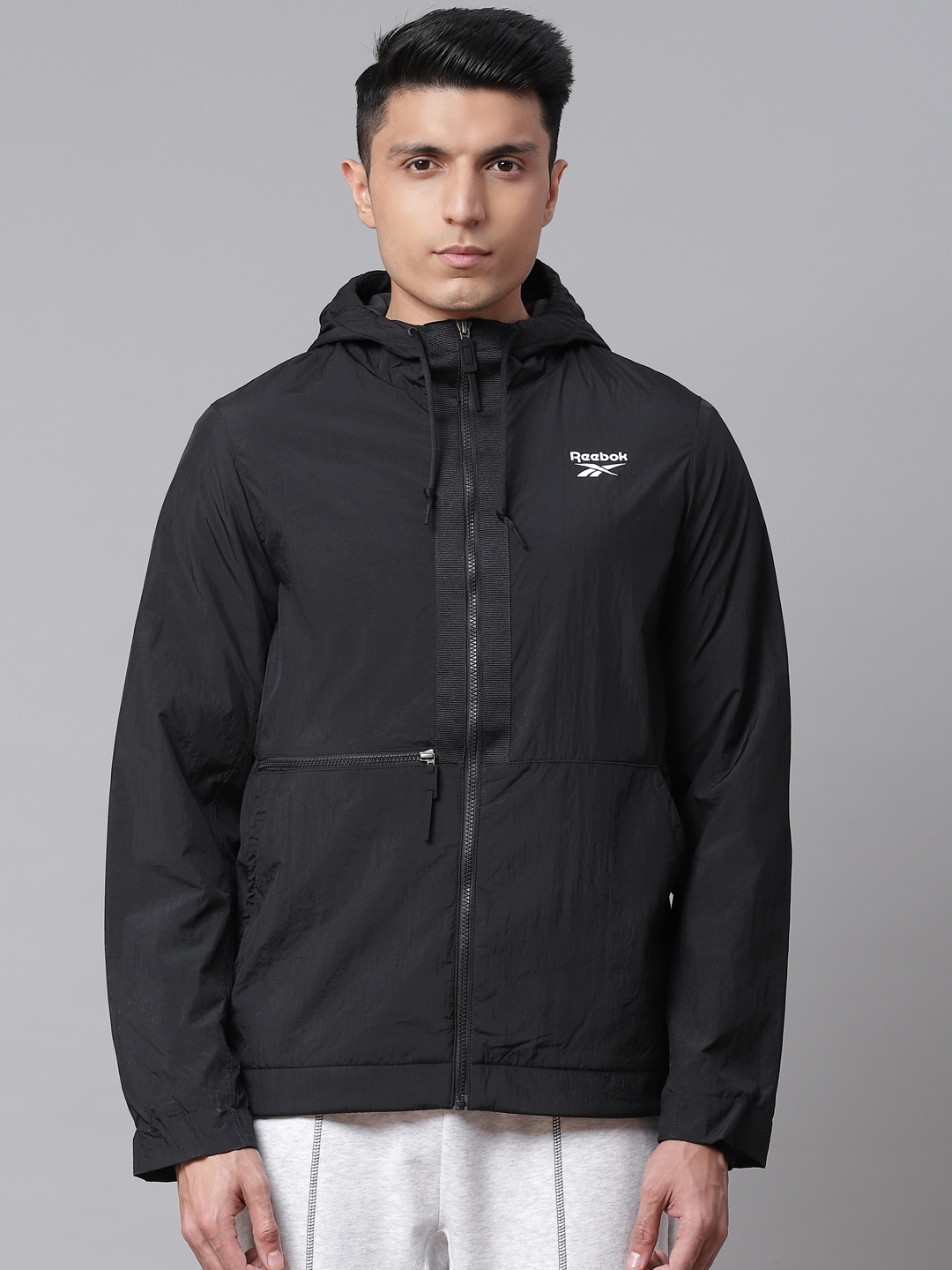 Buy Reebok Men Black Outerwear Core Fleece Solid Outdoor Jacket ...
