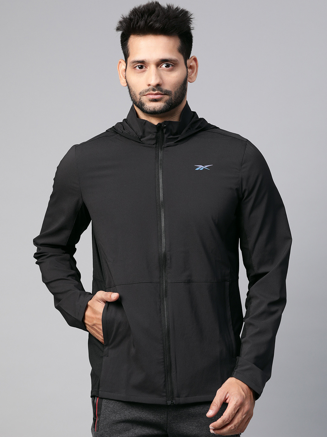 Buy Reebok Men Black Lightweight Solid OS Running Track Jacket ...