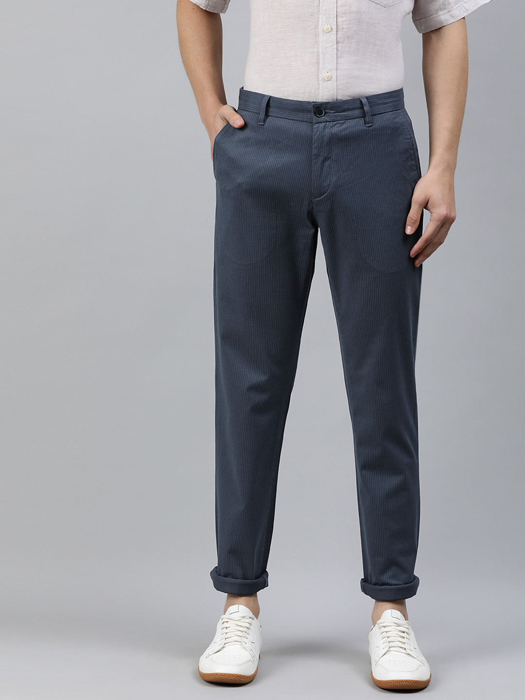 Buy Arrow Sport Men Blue Slim Fit Self Striped Regular Trousers ...