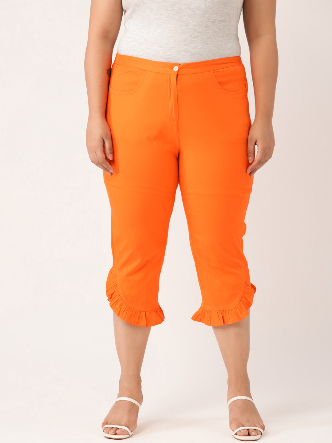 Buy Revolution Women Orange Solid Regular Fit Capris With Frill Detail ...