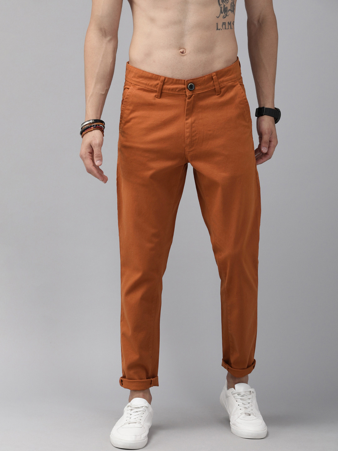 Buy Roadster Men Rust Brown Regular Fit Solid Regular Trousers ...