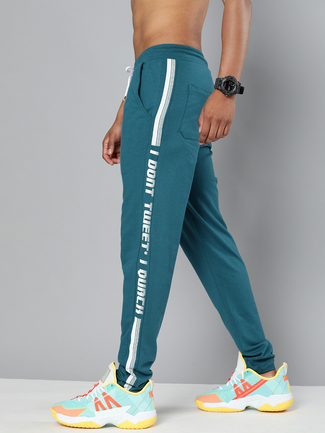 Buy Kook N Keech Disney Men Teal Blue Solid Track Pants With Side Print ...