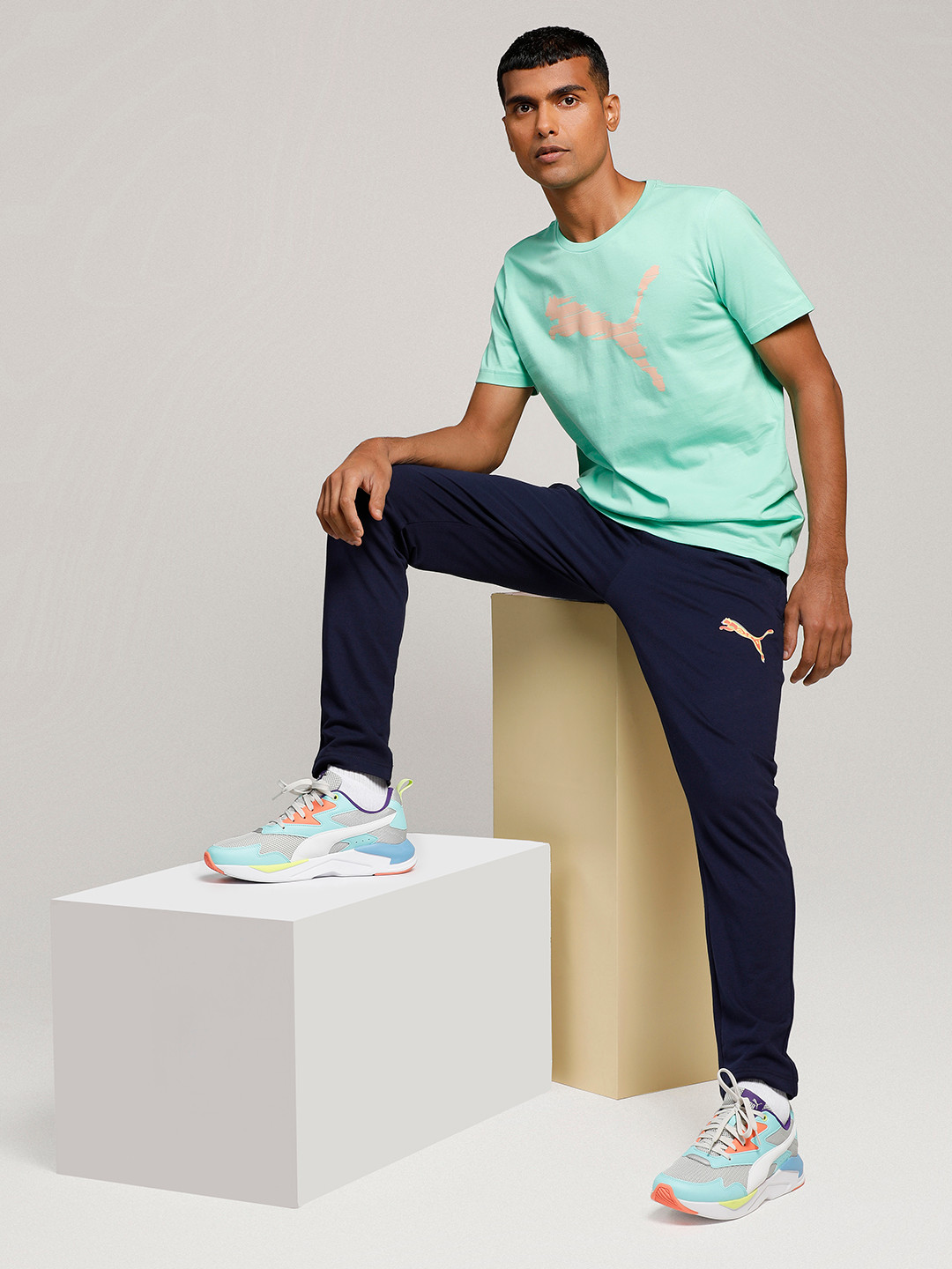 Buy Puma Men Navy Blue Solid Straight Fit Track Pants - Track Pants for ...
