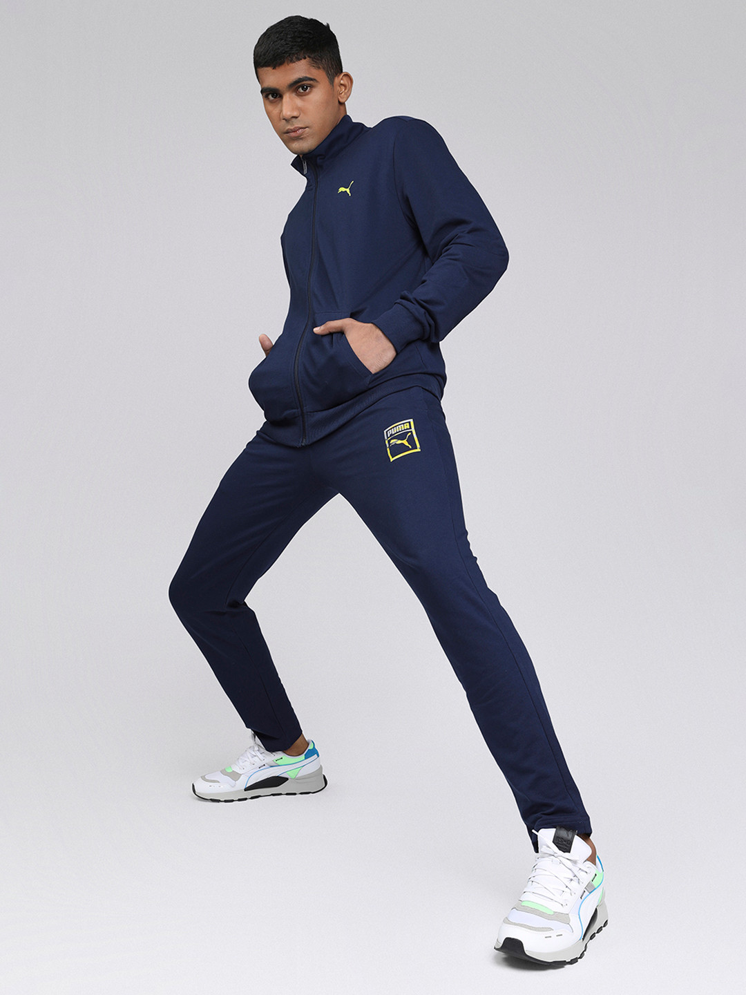 Buy Puma Men Navy Blue Solid Straight Fit Track Pants - Track Pants for ...