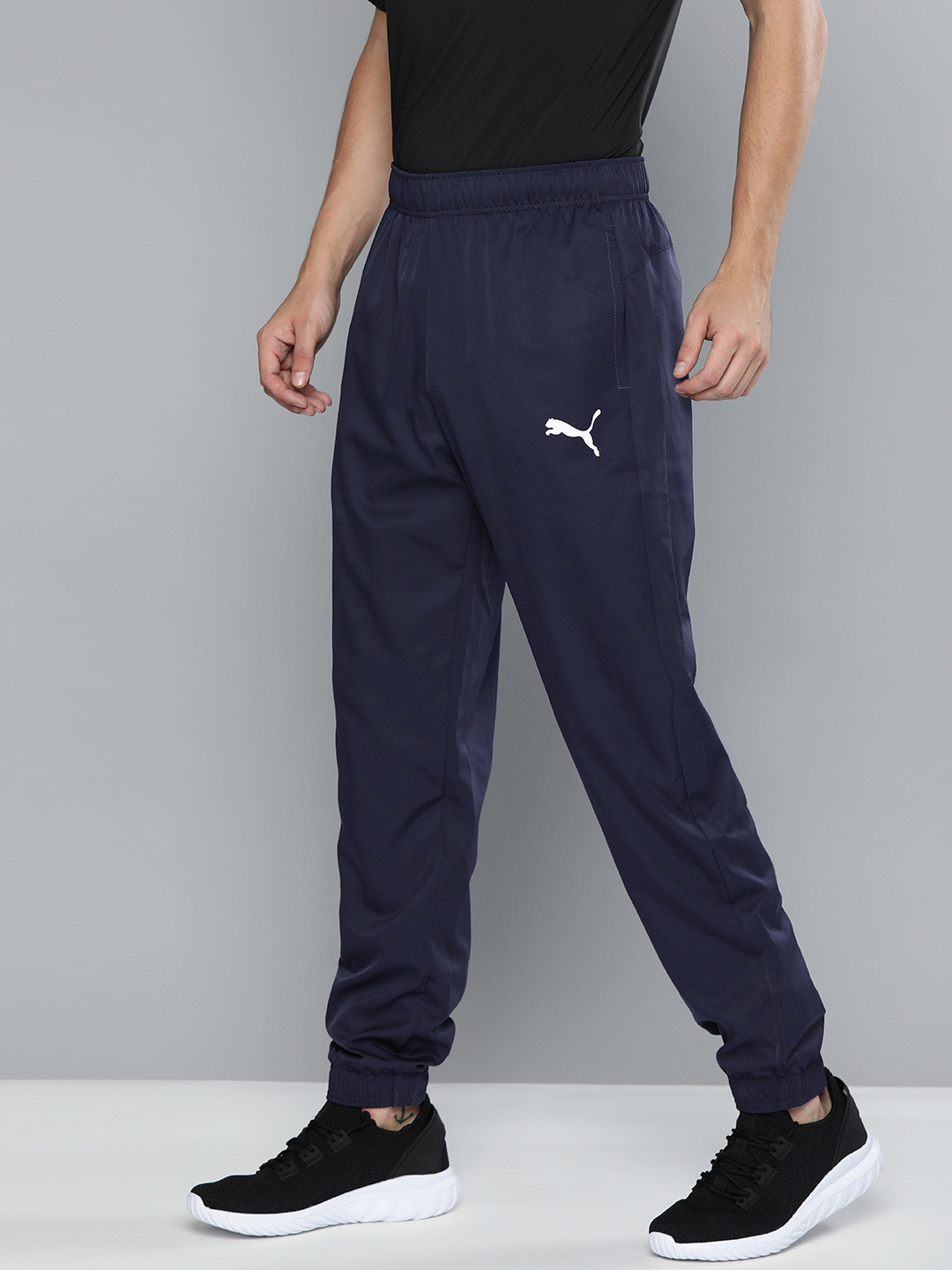 Buy Puma Men Navy Blue Solid DryCell ACTIVE Sustainable Joggers - Track ...