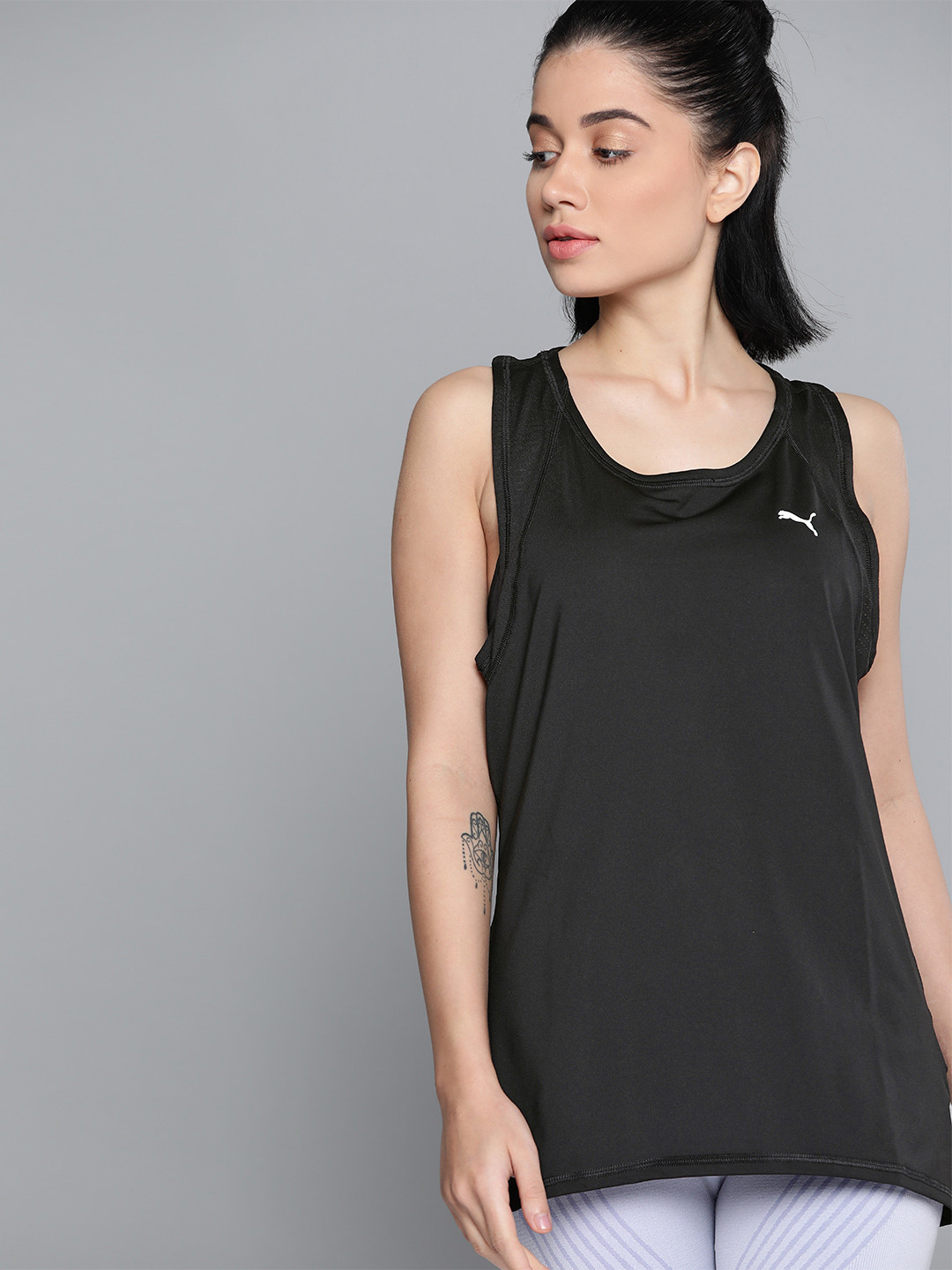 Buy Puma Women Black Solid Train Favorite Tank Top - Tops for Women ...