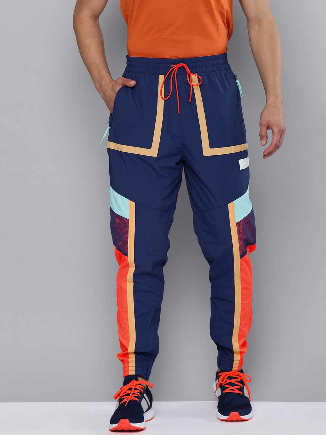Buy PUMA Hoops Blue & Orange Colourblocked Court Side Track Pants ...