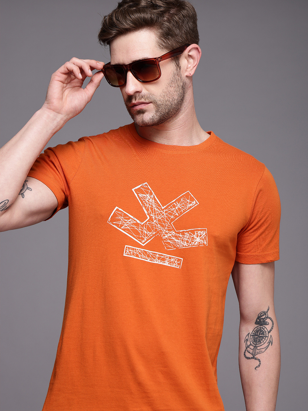 Buy WROGN Men Rust Orange Brand Logo Printed Slim Fit Pure Cotton T ...