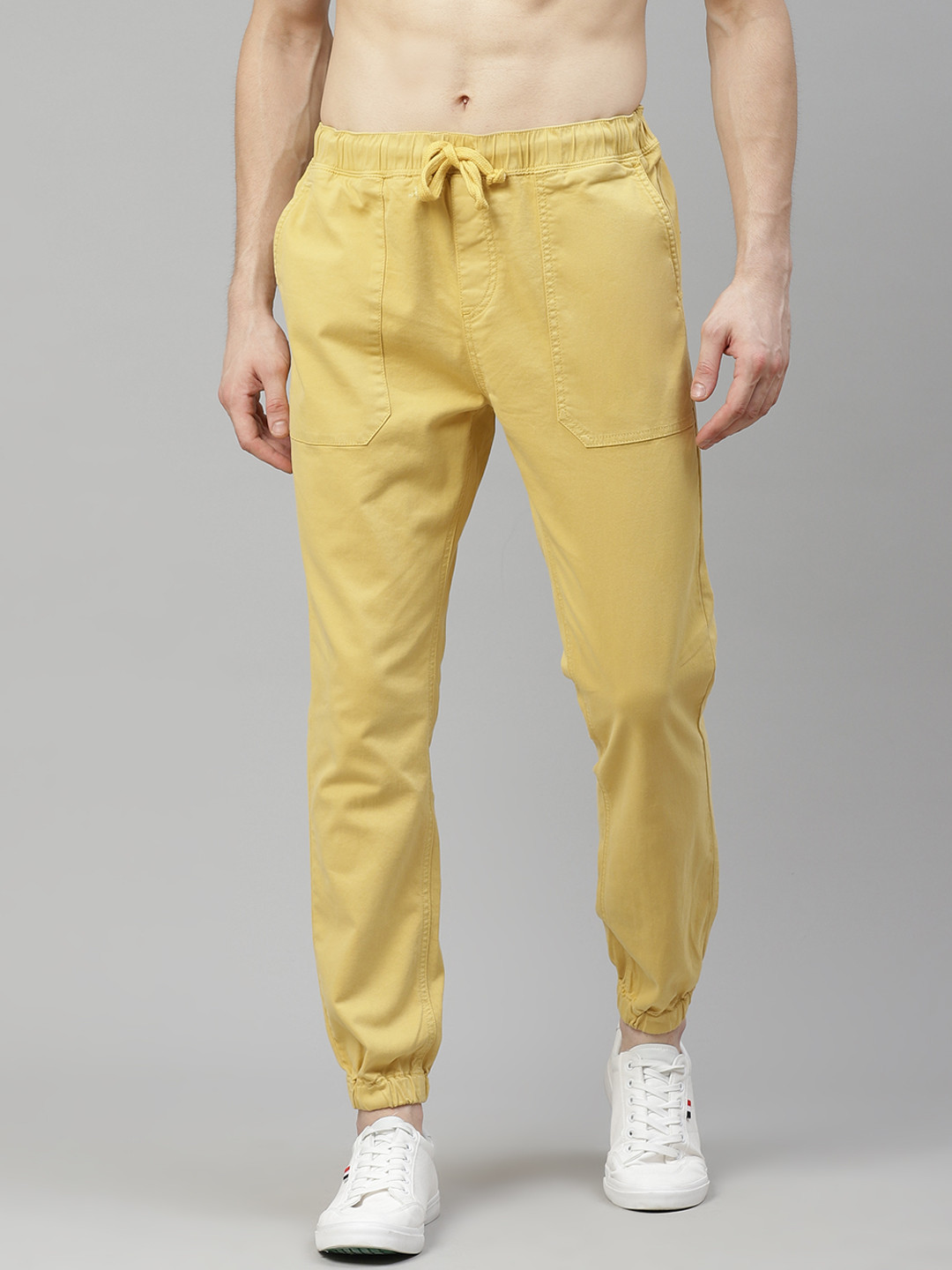 Buy HERE&NOW Men Yellow Solid Joggers - Trousers for Men 13767598 | Myntra