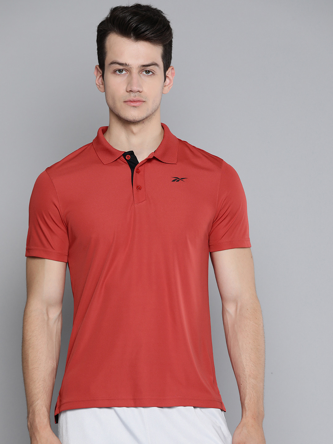 Buy Reebok Men Rust Brown Solid Training Foundation Poly Polo T Shirt ...
