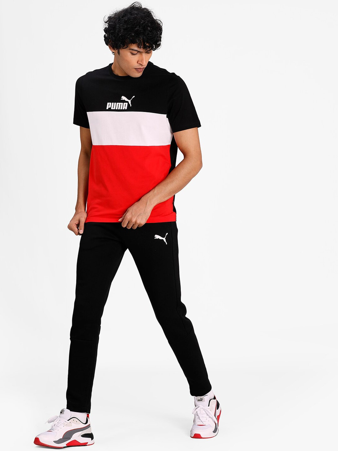 Buy Puma Men Black EVOSTRIPE Core Solid Slim Fit Sustainable Track ...