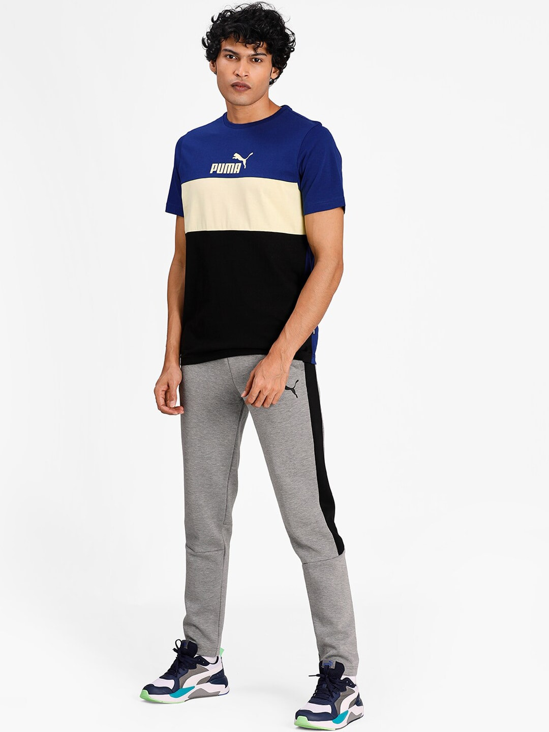 Buy Puma Men Grey Striped EVOSTRIPE Slim Fit Sustainable Track Pants ...