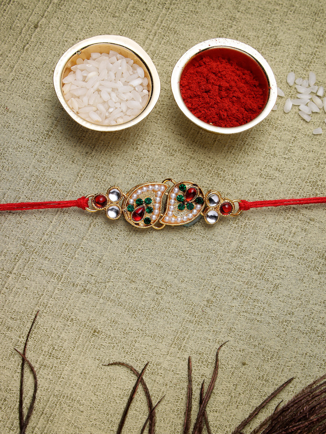 Buy Sukkhi Rakhi Men Red Gold Plated Stone Studded Rakhi With Roli ...