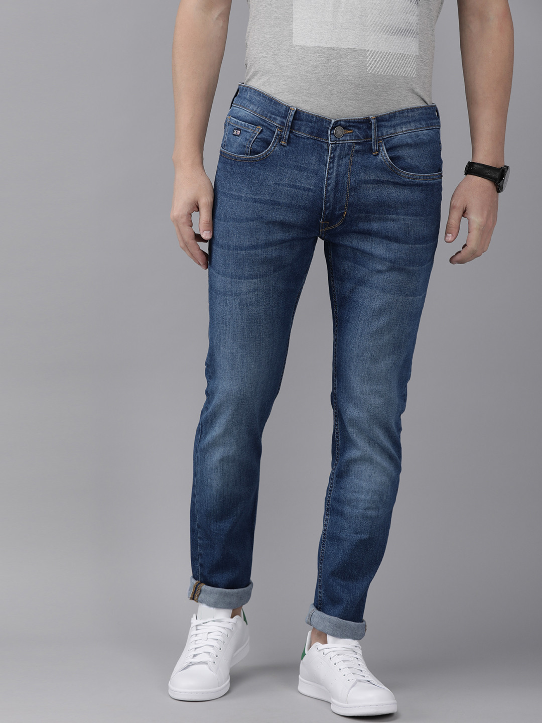 Buy Arrow Sport Men Blue Solid Slim Fit Heavy Fade Stretchable Jeans ...