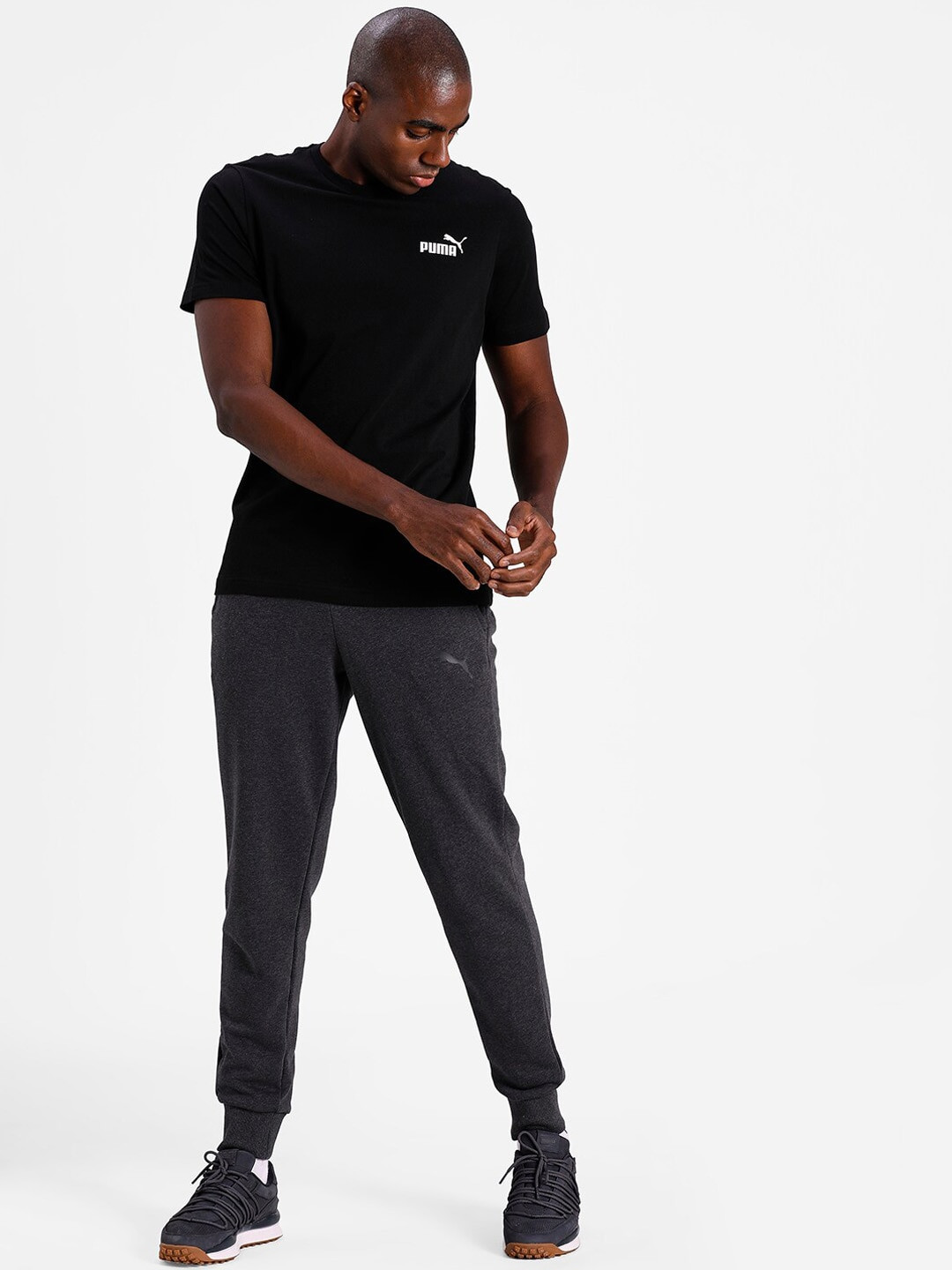 Buy Puma Men Grey Solid Sustainable ESS Logo Pants - Track Pants for ...