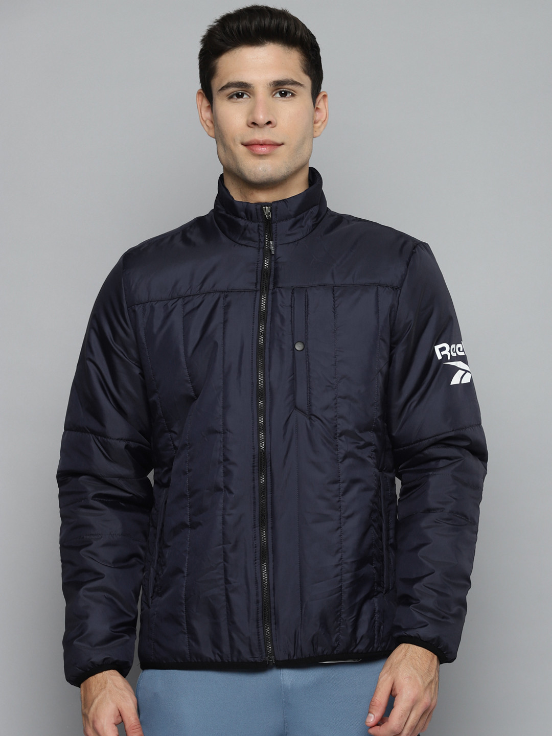 Buy Reebok Men Navy Blue Solid BAS Light Padded Jacket - Jackets for ...