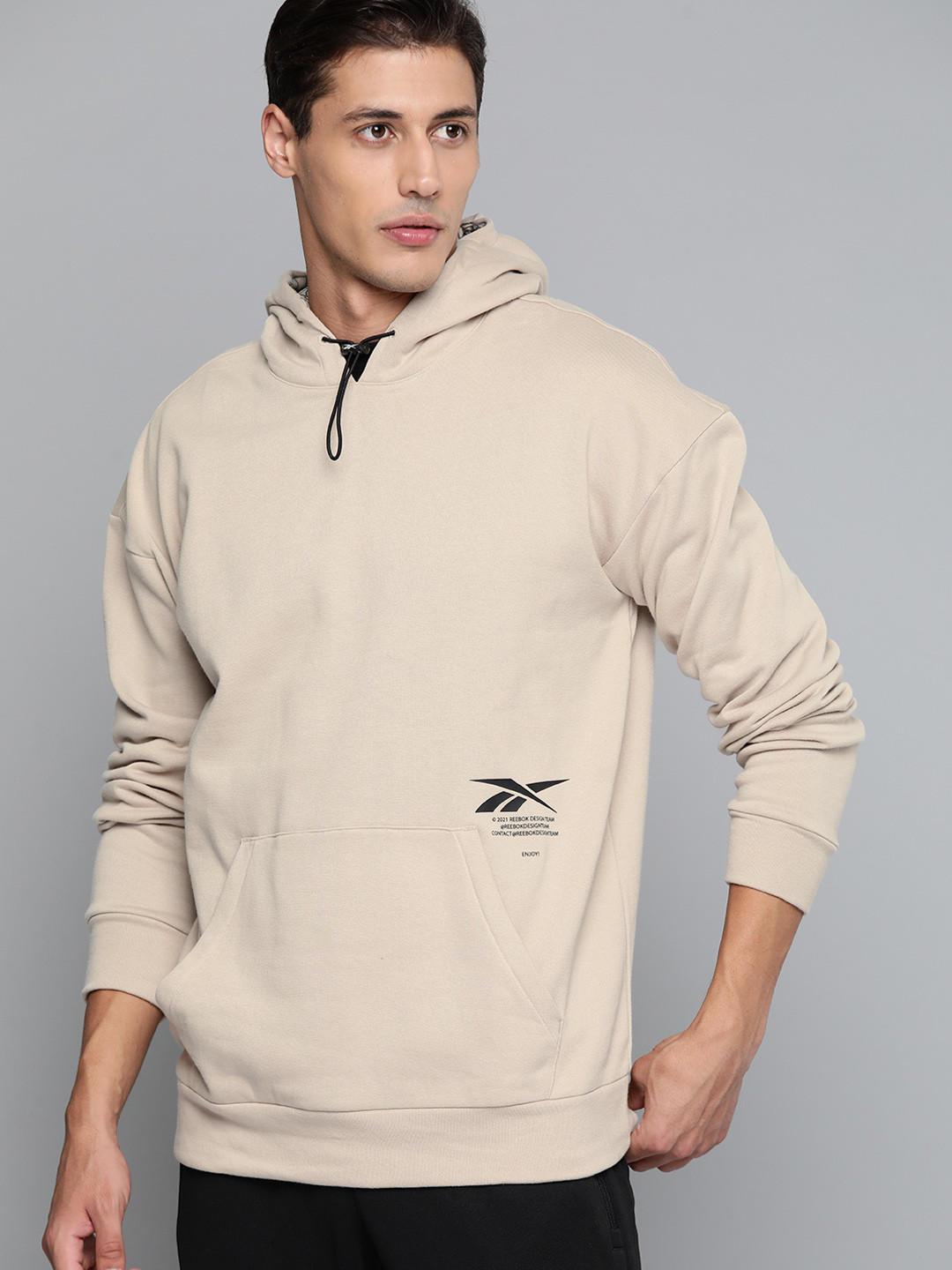 Buy Reebok Men Beige Solid Thermowarm + Graphene Cotton Fleece Hooded ...