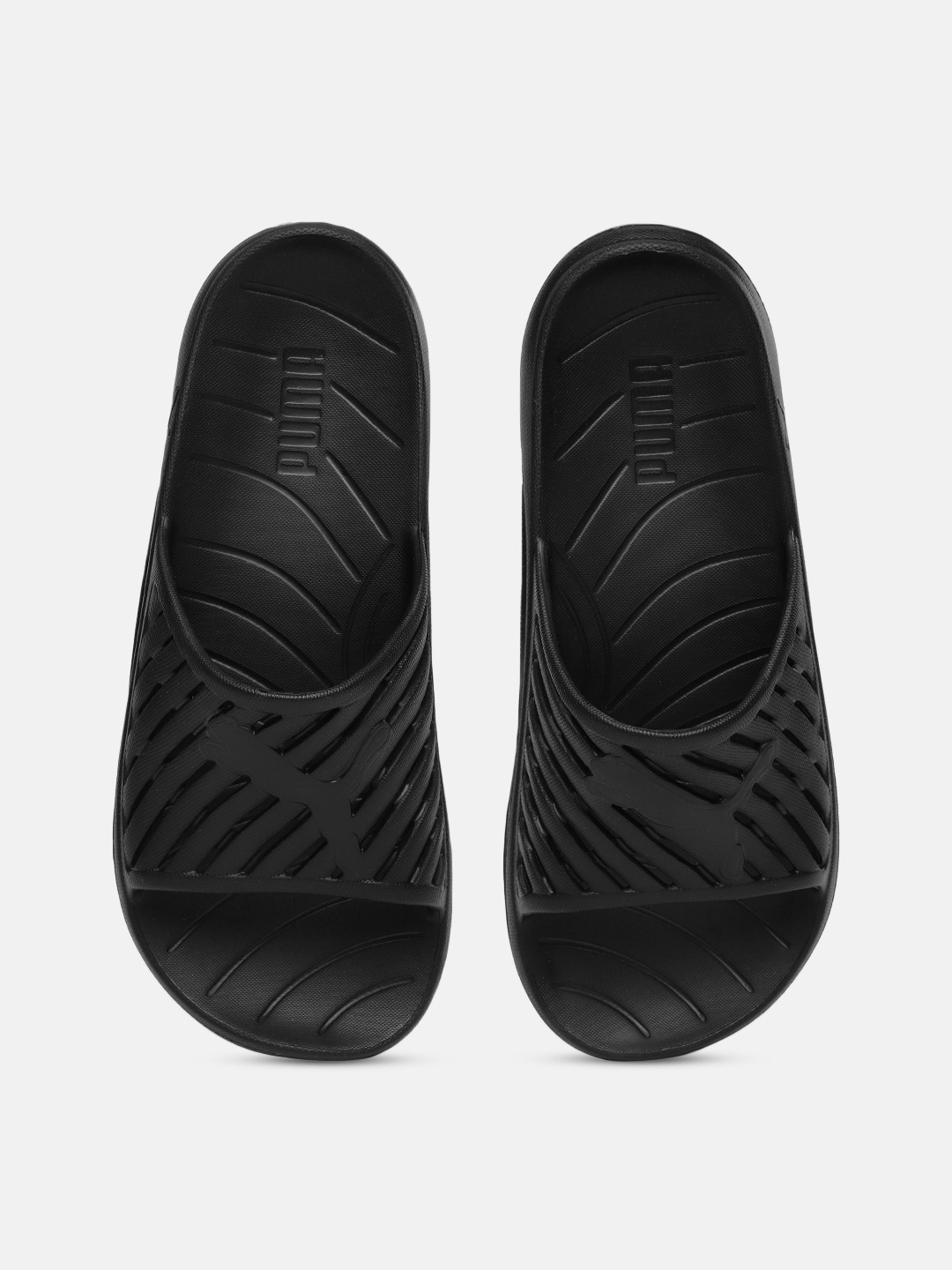 Buy Puma Unisex Black Solid Jetcat Sliders - Flip Flops for Unisex ...