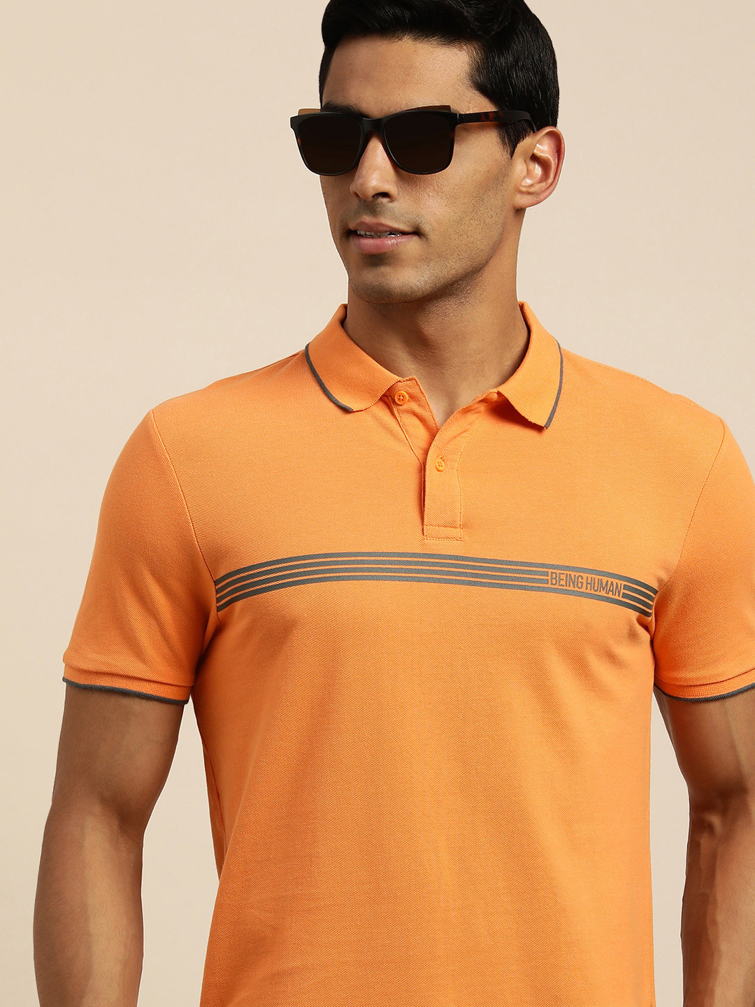 Buy Being Human Men Orange Printed Polo Collar Pure Cotton T Shirt ...