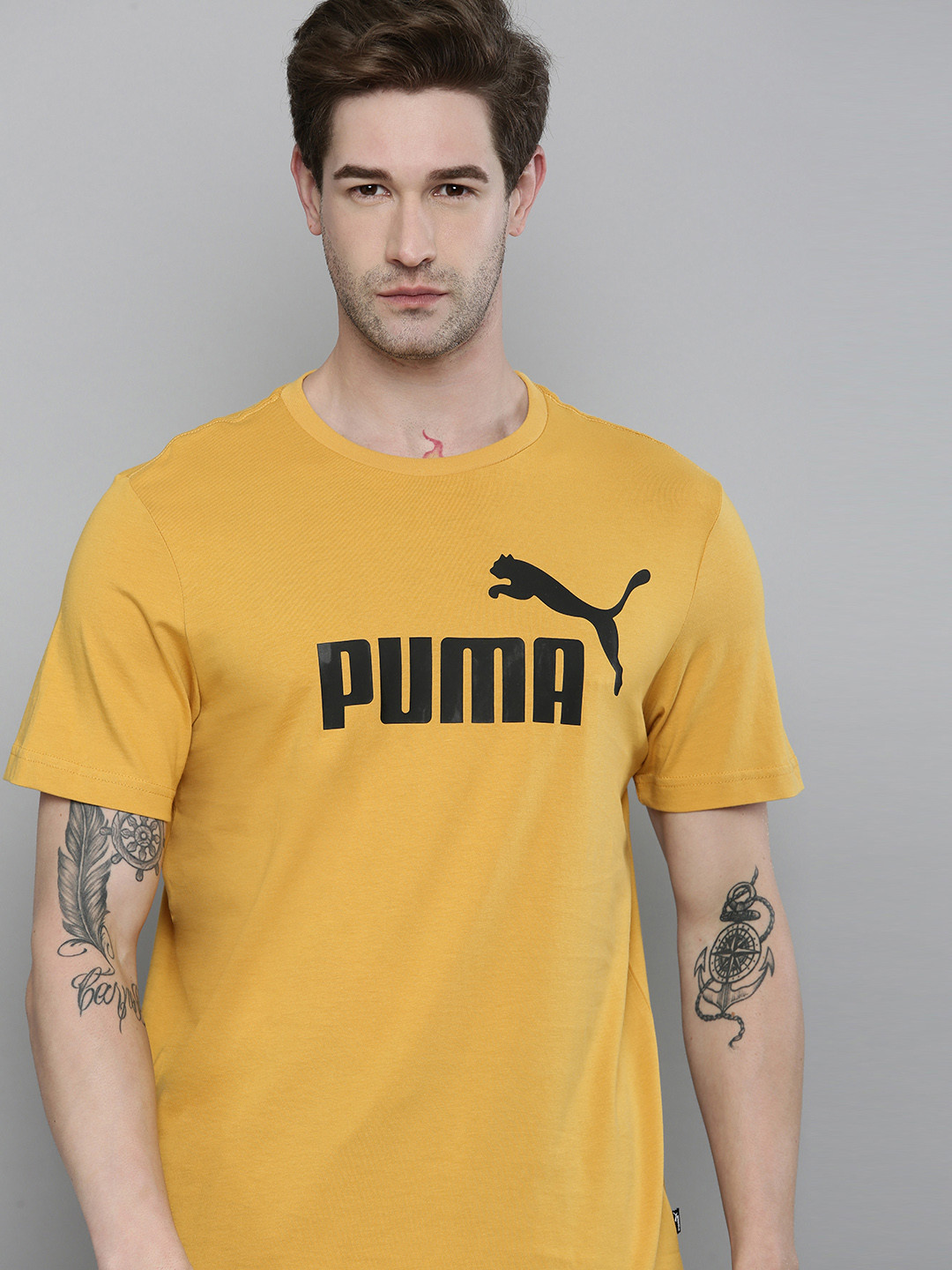 Buy Puma Men Yellow Brand Logo Printed Essentials T Shirt - Tshirts for ...