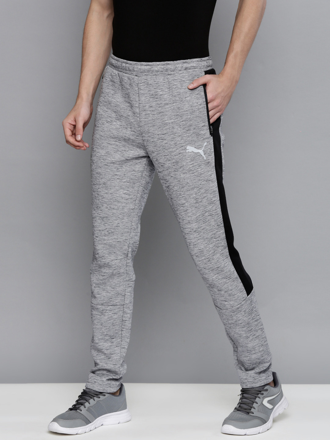 Buy Puma Men Grey Solid EVOSTRIPE Knitted Drycell Slim Fit Track Pants ...